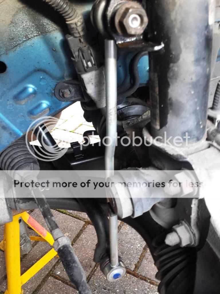 nearside front upper suspension arm has slight play in a ball joint